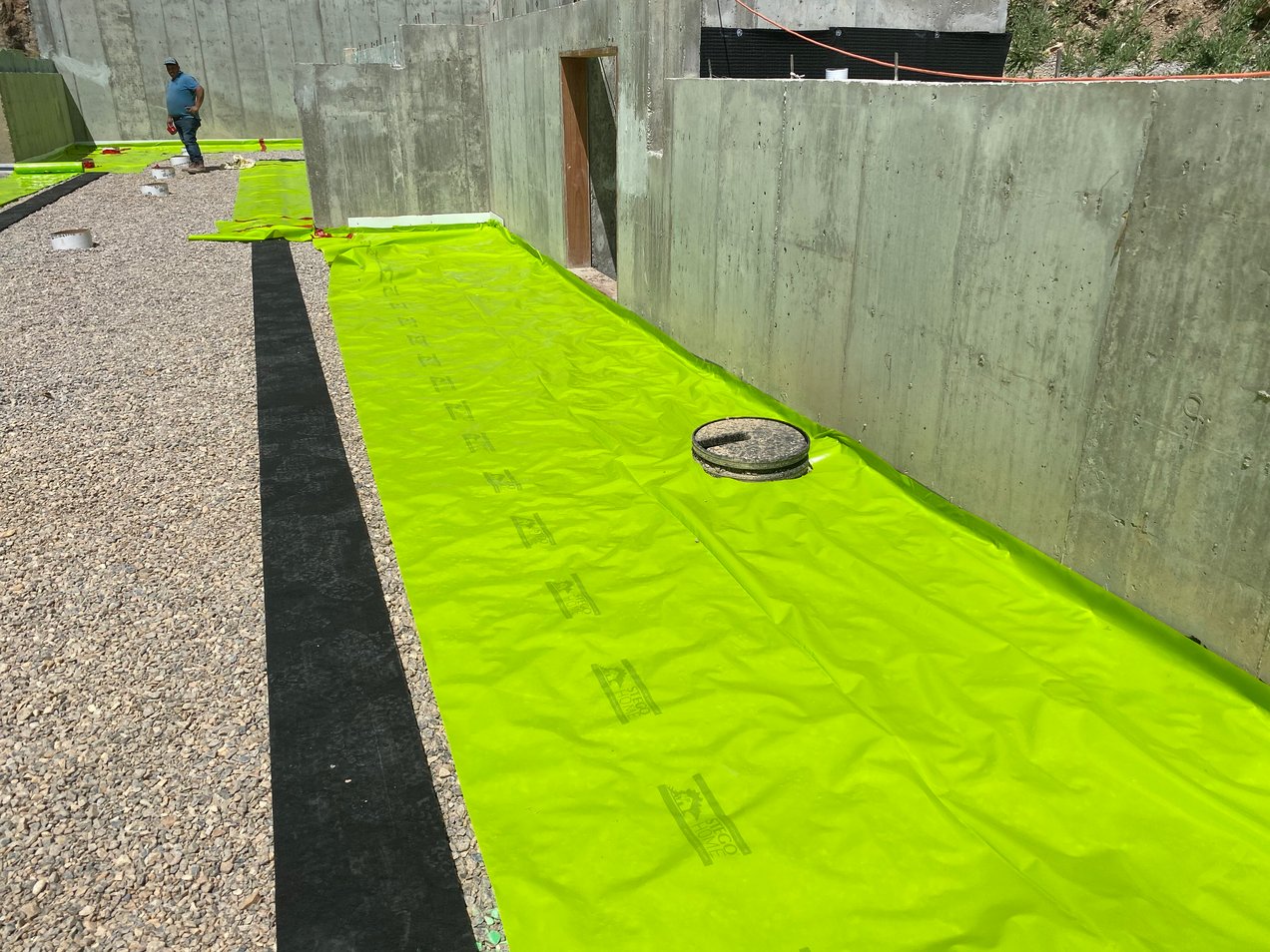 How a Vapor Barrier Can Help Mitigate Radon in New Residential Construction